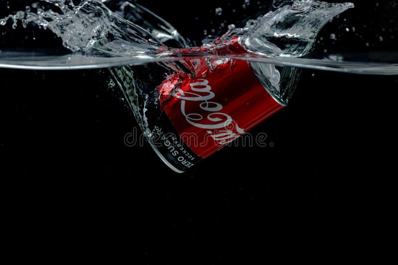 Close Up View of Can Falling in Water. Coca Cola Editorial Photography ...