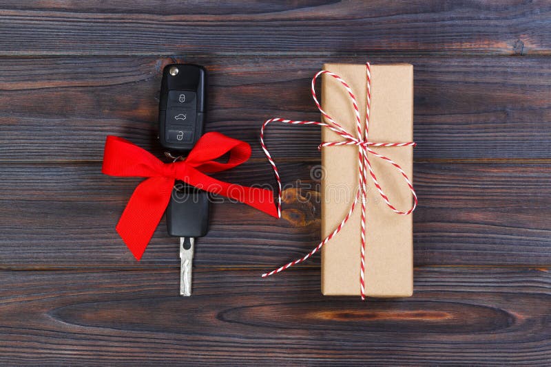 Close-up View of Car Keys with Red Bow As Present on Wooden Background ...