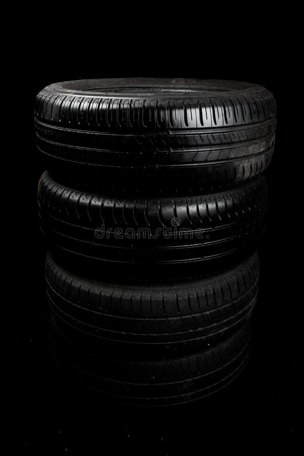 Car Tyre Isolated on a Black Background Stock Image - Image of closeup ...