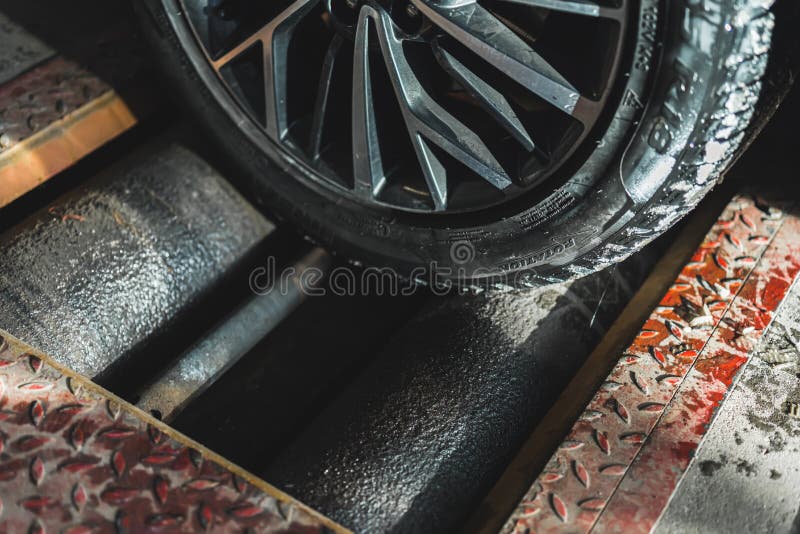 Close-up View of a Car Wheel during a Geometry Check Ensuring Proper ...