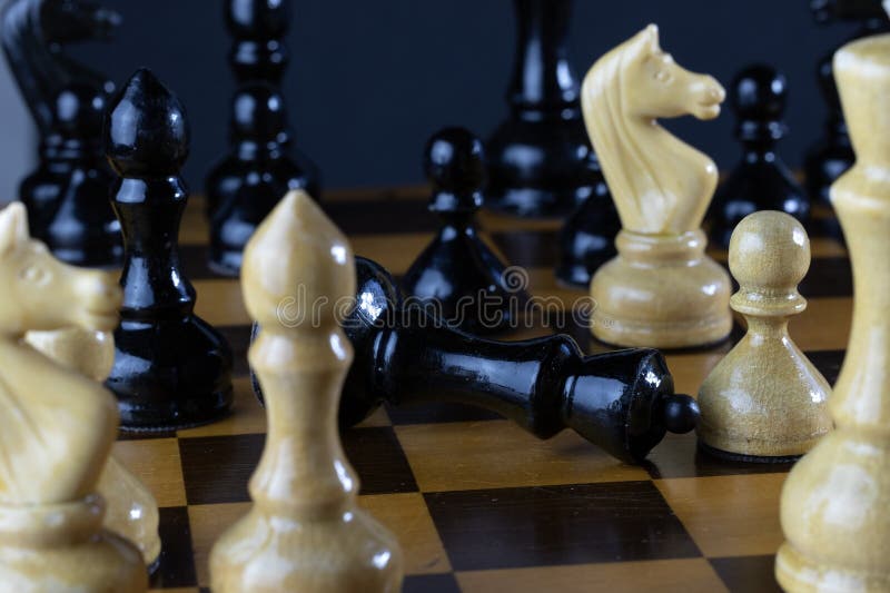 A Close-up View of a Chessboard with Black and White Pieces. Stock ...