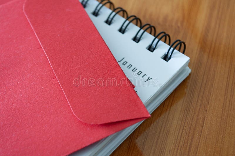 Close Up View of Chinese New Year Red Packets with January Table ...