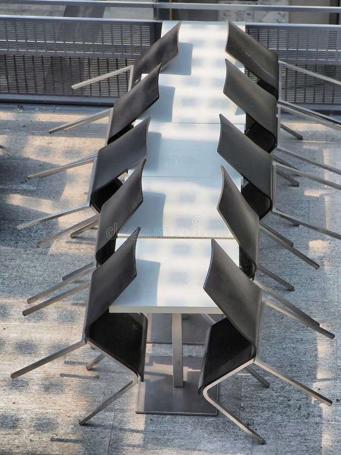 Close Up View of Closed Restaurant Table and Chairs Stock Image - Image ...
