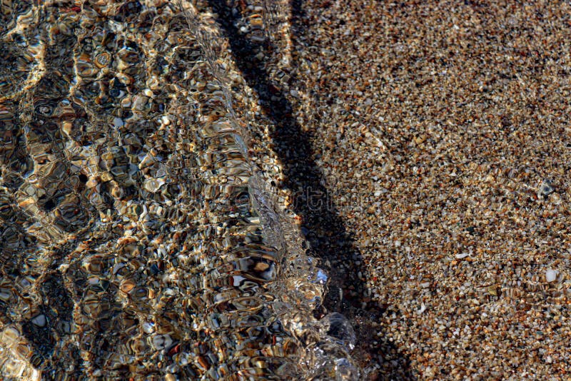 Close up sand and sea stock image. Image of tropical - 251673741