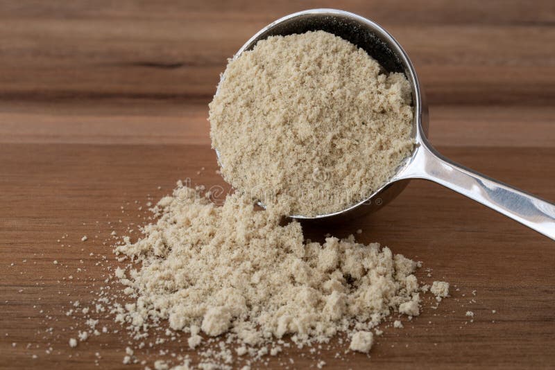 Coconut Protein Powder Spilled from a Scoop Stock Photo - Image of ...