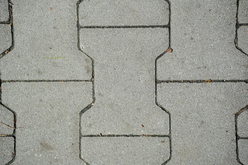 A Close-up View of Concrete Pavement Surface, Showcasing Interlocking ...