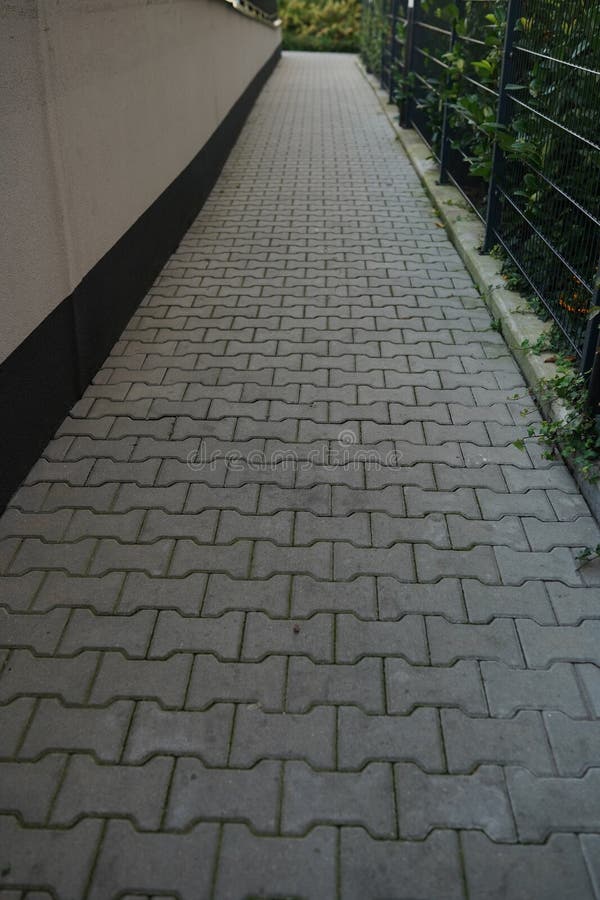 A Close-up View of Concrete Pavement Surface, Showcasing Interlocking ...