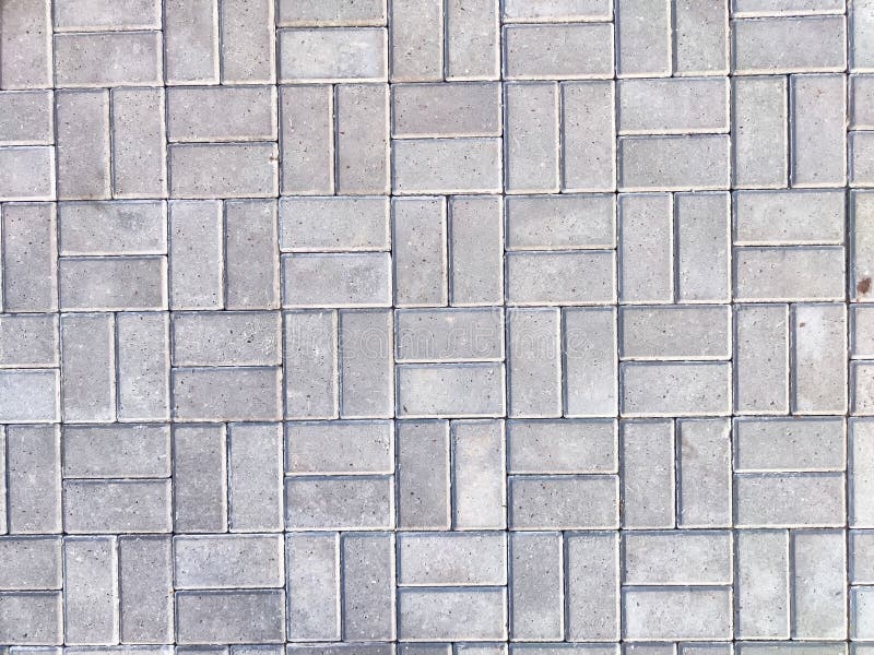 A Close-up View of a Concrete Pavement Surface, Showcasing Interlocking ...