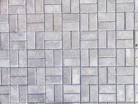 A Close-up View of a Concrete Pavement Surface, Showcasing Interlocking ...