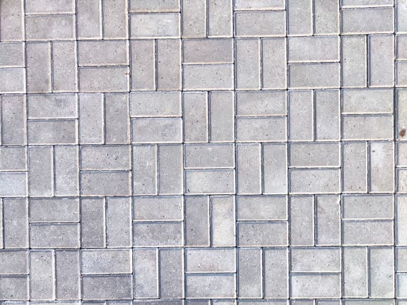 A Close-up View of a Concrete Pavement Surface, Showcasing Interlocking ...