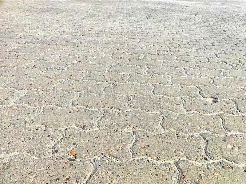 A Close-up View of a Concrete Pavement Surface, Showcasing Interlocking ...