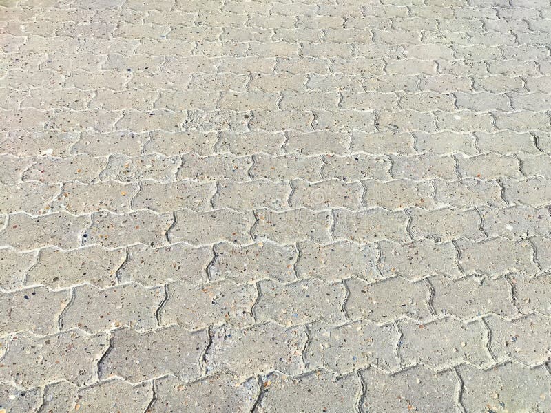 A Close-up View of a Concrete Pavement Surface, Showcasing Interlocking ...