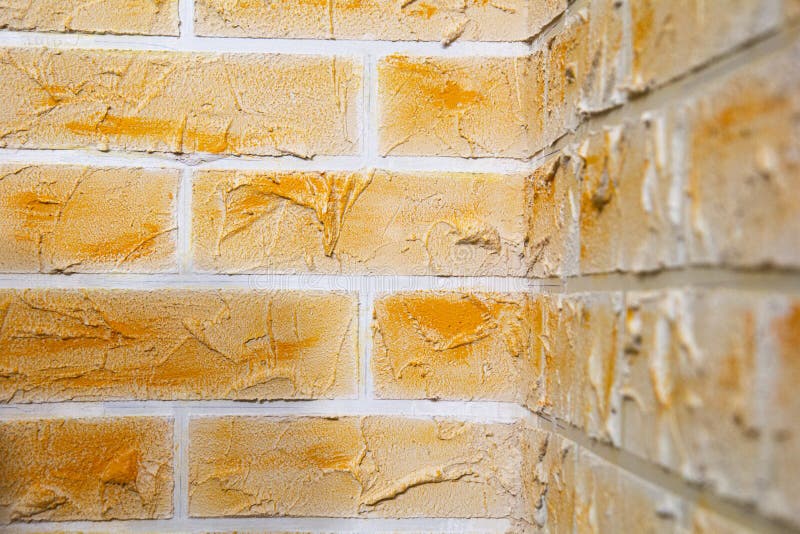 Close Up View of Corner of Wall Made of Hand Made Orange Gypsum Plaster ...
