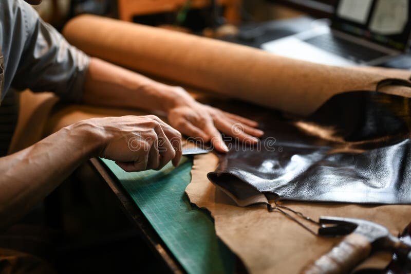 Close Up View of Craftsman Skillfully Using a Cutting Tool To Shape the ...
