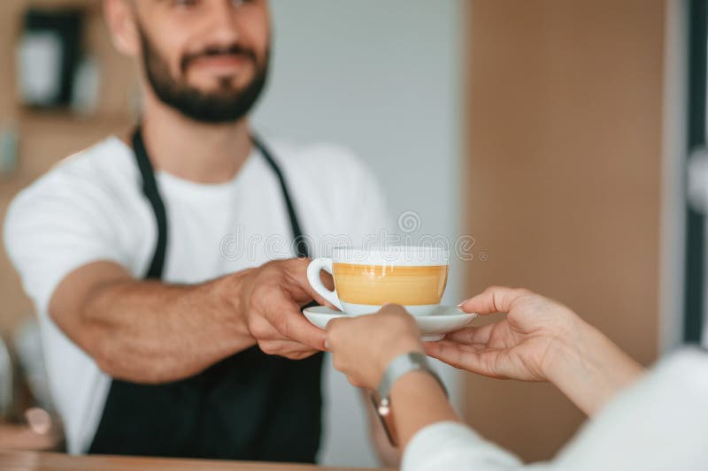 Close Up View. Customer Takes Her Order from Barista in the Cafe Stock ...