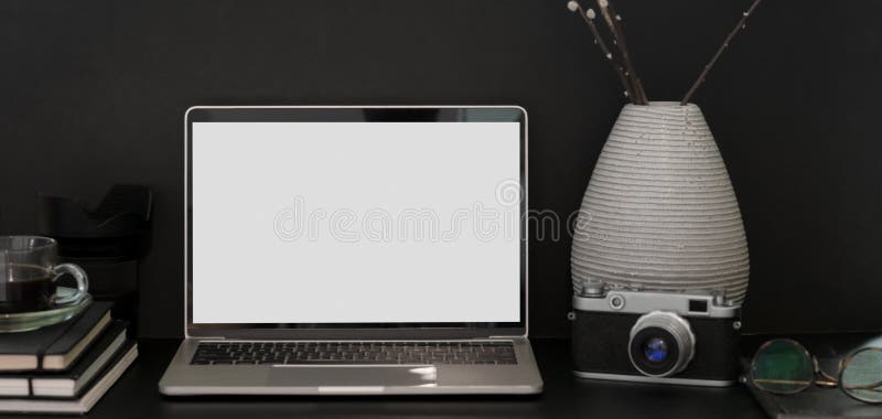 Close-up View of Dark Luxury Workplace with Open Blank Screen Laptop ...
