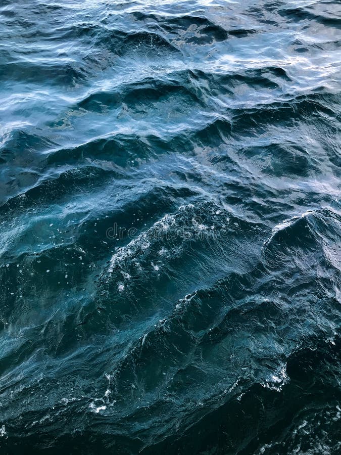 Deep Blue Ocean Waves with Ripples and Reflections Stock Image - Image ...