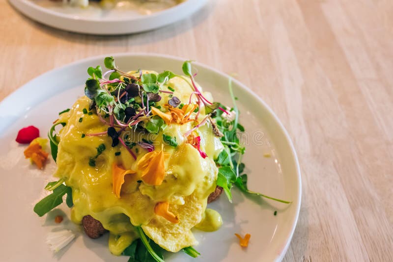 Close-up View of the Delicious Eggs Benedict on the Plate Stock Photo ...