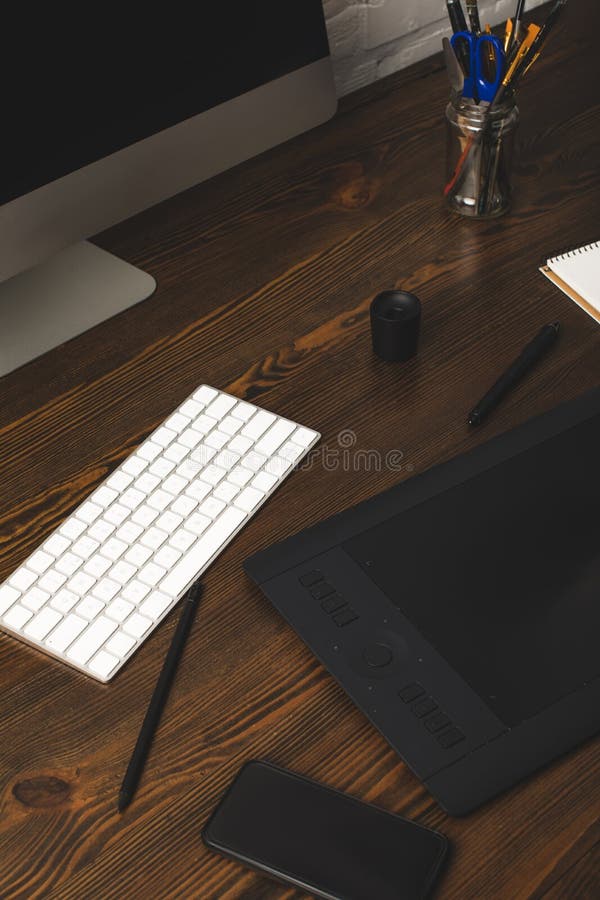 Desktop Computer, Graphics Tablet and Keyboard on Wooden Table Stock ...
