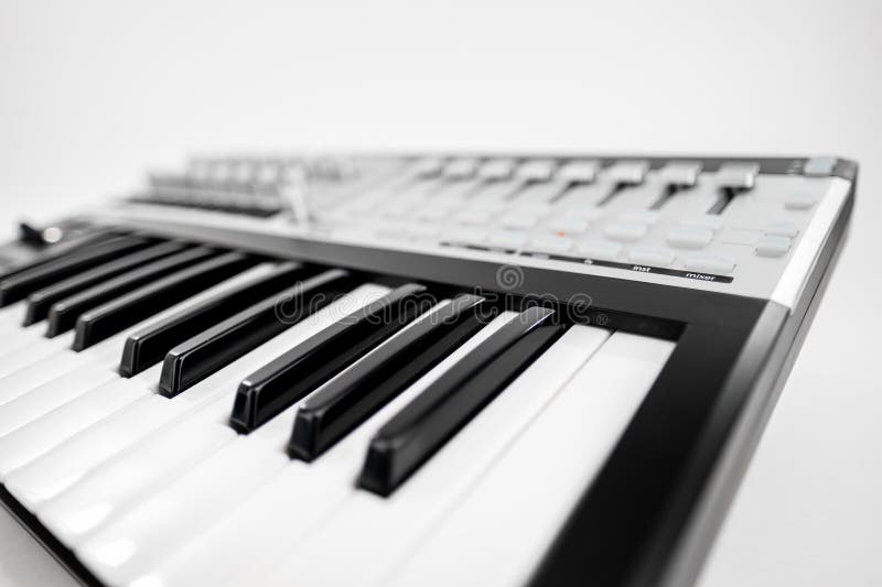 Close-Up View of a Digital Keyboard with Black and White Keys on a ...