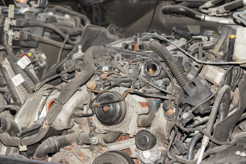 Close-up View of a Disassembled Car Engine with Exposed Components ...