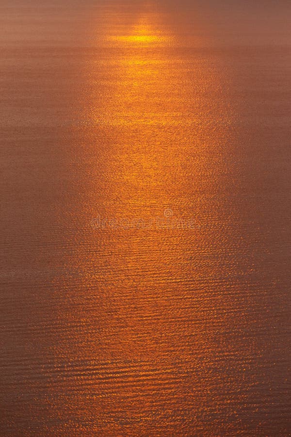 A Dramatic Orange Sun Way of Reflections in Water Stock Image - Image ...
