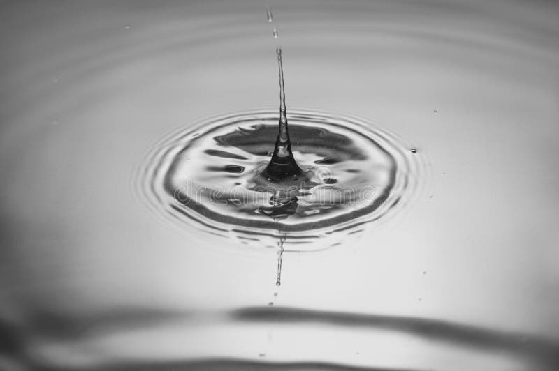 Close Up View of Drops Making Circles on Water Surface Isolated on ...