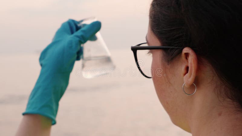 Close Up View of Ecologist in Rubber Gloves Testing Sample Flask of ...