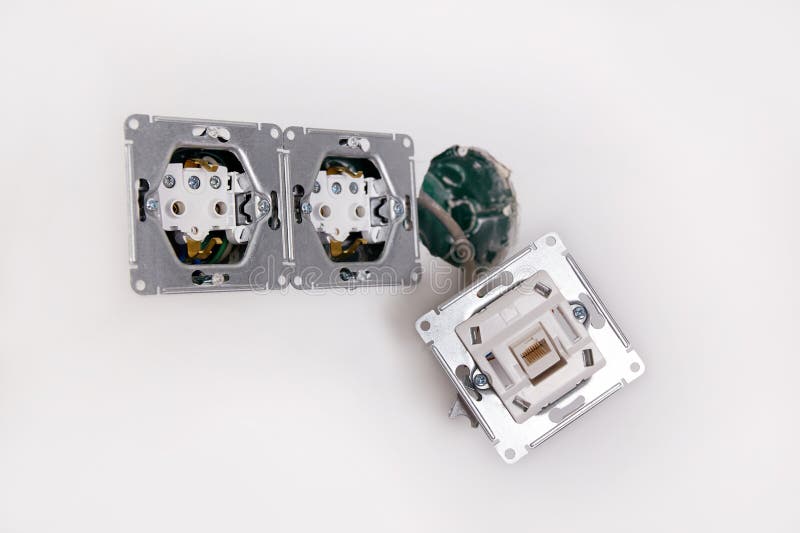 A Close-up View of an Electrical Outlet Being Installed into a Wall ...