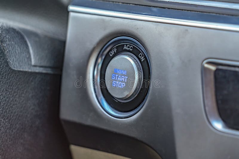 Close Up View of an Engine Push Start and Stop Button Inside a Vehicle ...