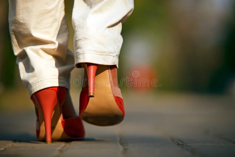 Close-up View of Female in Red Shoes Walking Stock Photo - Image of ...