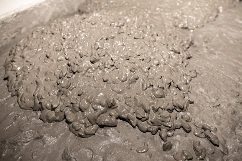 Wet Cement Spreading on a Construction Floor Surface Close-up Stock ...