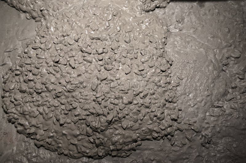 Wet Cement Spreading on a Construction Floor Surface Close-up Stock ...