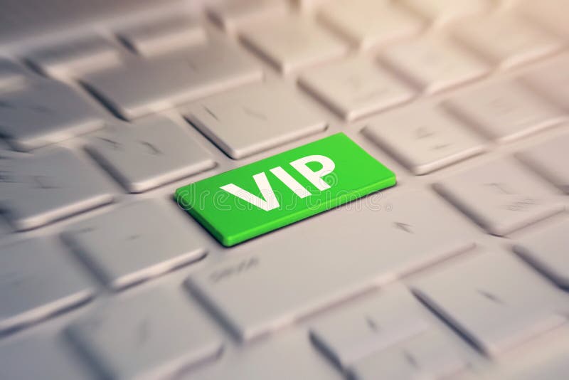 Close-up View on Gray Conceptual Keyboard VIP Green Key. Blurred in ...