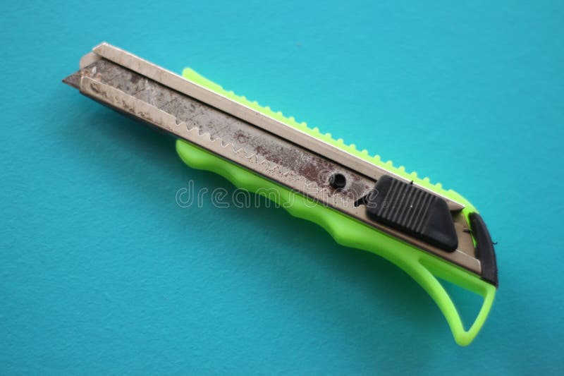 Close Up View of Green Cardboard Cutter Stock Image - Image of cutter ...