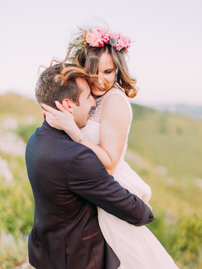 The Close-up View of the Groom Carrying the Bride. Stock Photo - Image ...