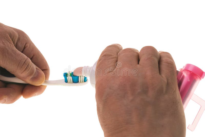 Close Up View of Hands Holding Toothpaste and Toothbrush Stock Photo ...