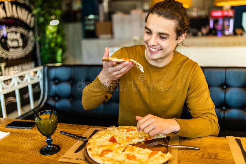 Close-up View of Happy Man Eating Pizza in Cafe Stock Image - Image of ...