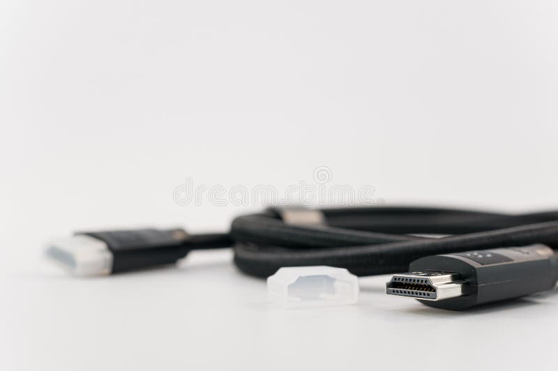 Close Up View of HDMI Connector and Cable on a White Desktop Stock ...