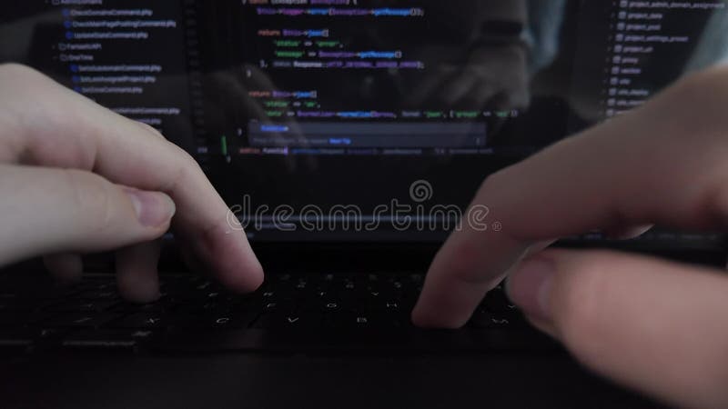 Professional Developer Hands Typing Programming Code on a Laptop Keyboard, Symbolizing Efficient ...