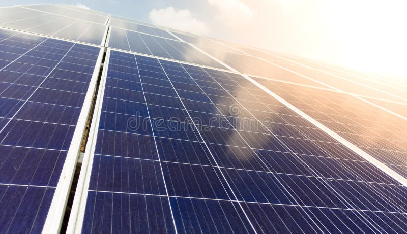 Side View of Installed Row of Photovoltaic Solar Panels / Modules at ...