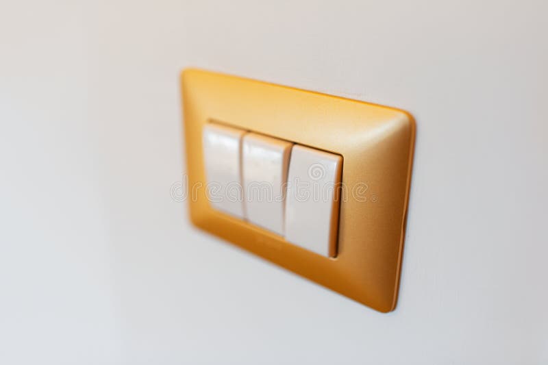Close-up View of Light Power Switch of White and Golden Colors Stock ...