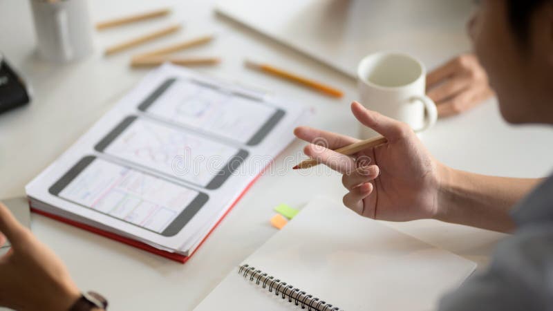 Close Up View of Male App Developer Discussing on His Project Stock ...