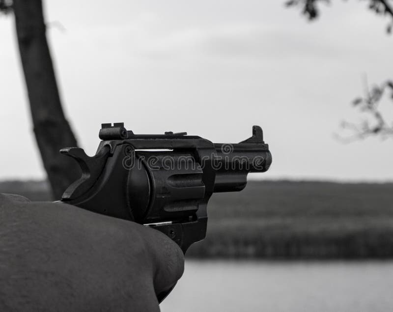Close-up View of Male Hands Aiming with Gun Stock Photo - Image of ...