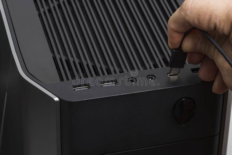Close Up View of Man Hand Connecting Usb Cable To Black Computer Stock ...