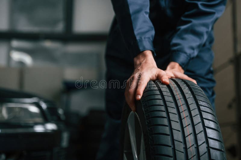 Close Up View of Man that is Moving Tire of the Car Stock Illustration ...