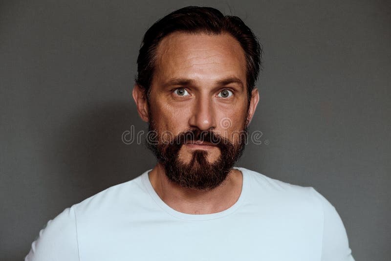 Close Up View of Mature Man with Serious Face. Stock Image - Image of ...