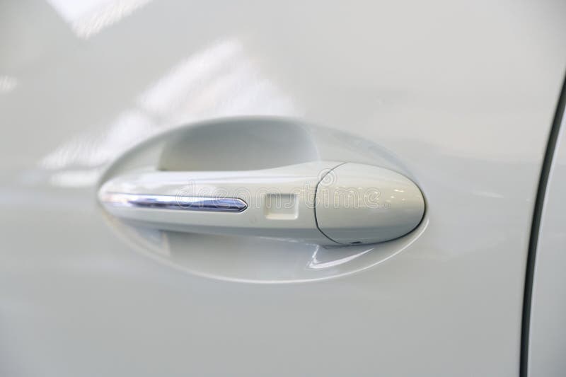 Close-up View of a Modern Car S Door Handle, Featuring a White Design ...