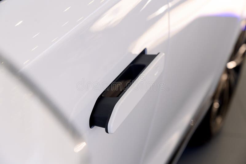 Close-up View of a Modern Car S Door Handle, Featuring a White Design ...