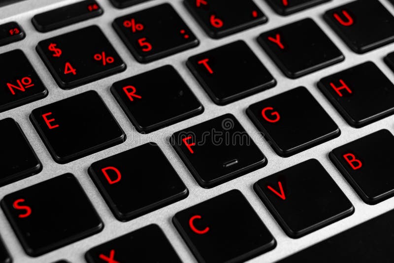 Close Up View of a Modern Laptop Computer Keyboard Key with Red ...